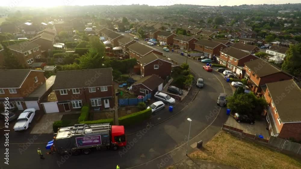 Aerial View, footage of Dustmen putting recycling waste into a garbage ...