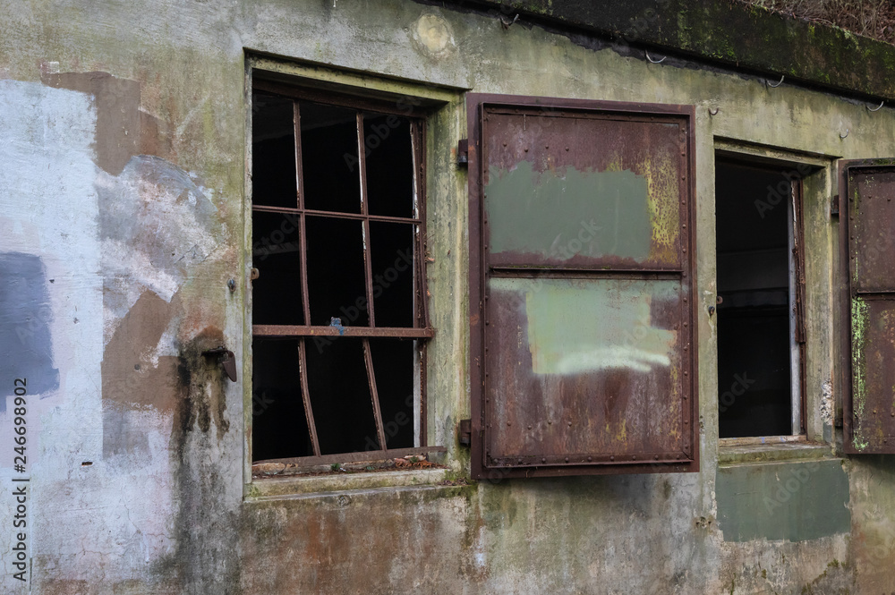 Rusting steel window at Fort Worden - an abandonded WWI era military ...