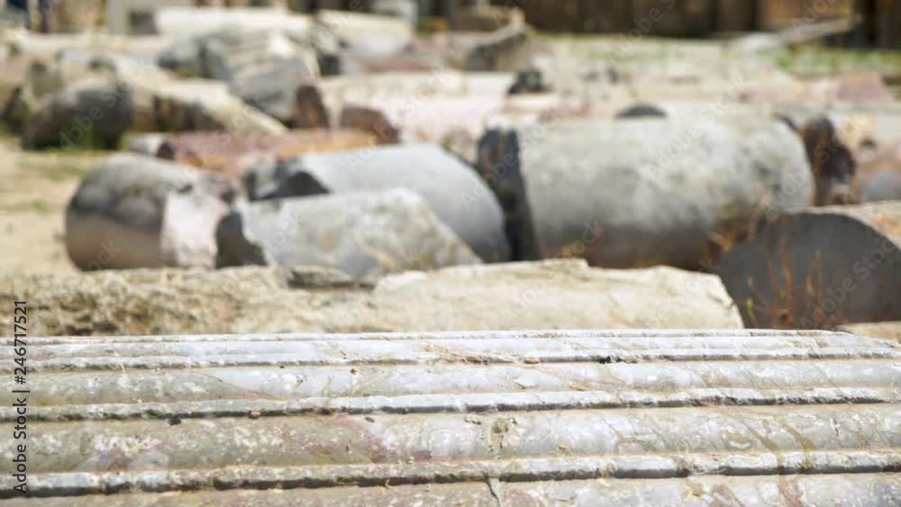 Old Roman Empire era columns lie broken and toppled to the ground at ...