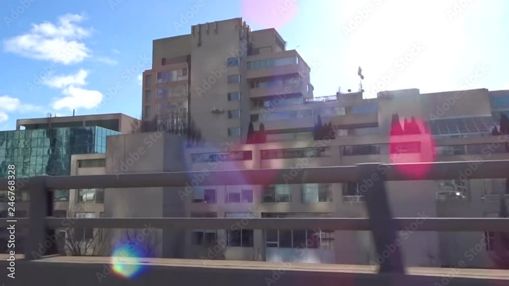 A dramatic side view of various buildings and architecture from a ...
