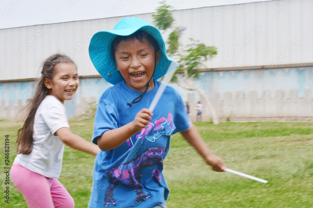Native american kids playing outside. Stock Photo | Adobe Stock