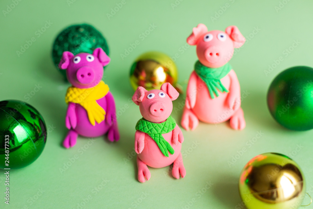 Hand made little plasticine pigs Stock Photo | Adobe Stock