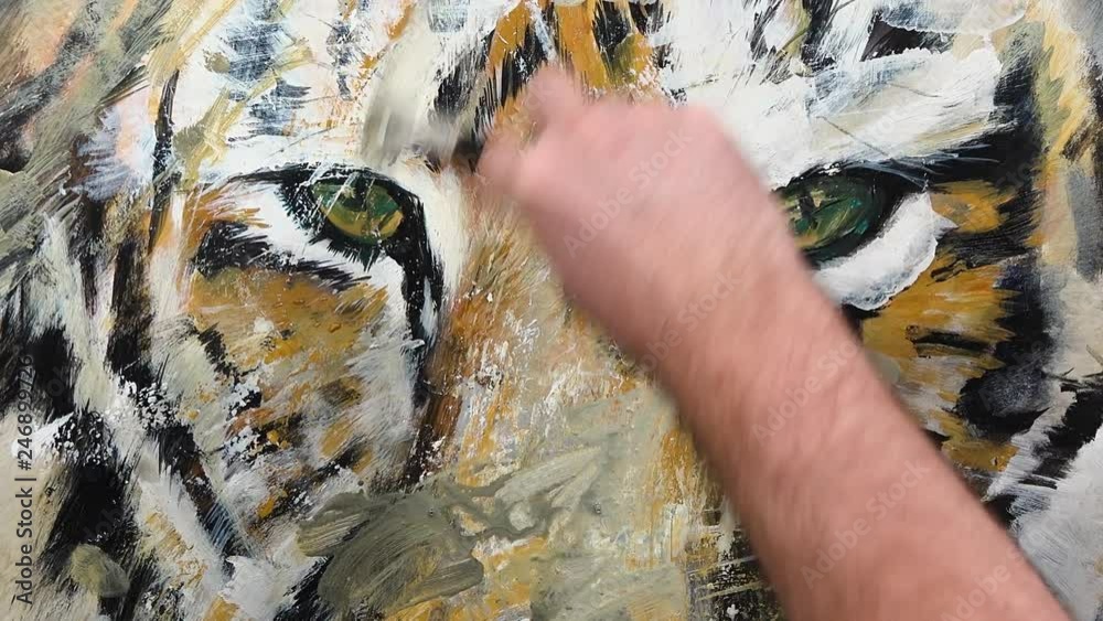 Artistic hand-painting of a tiger's eye Stock ビデオ | Adobe Stock