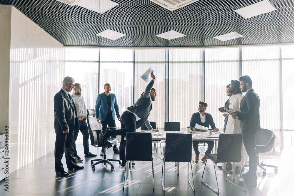 Foto de Interracial partners arguing during team building training ...