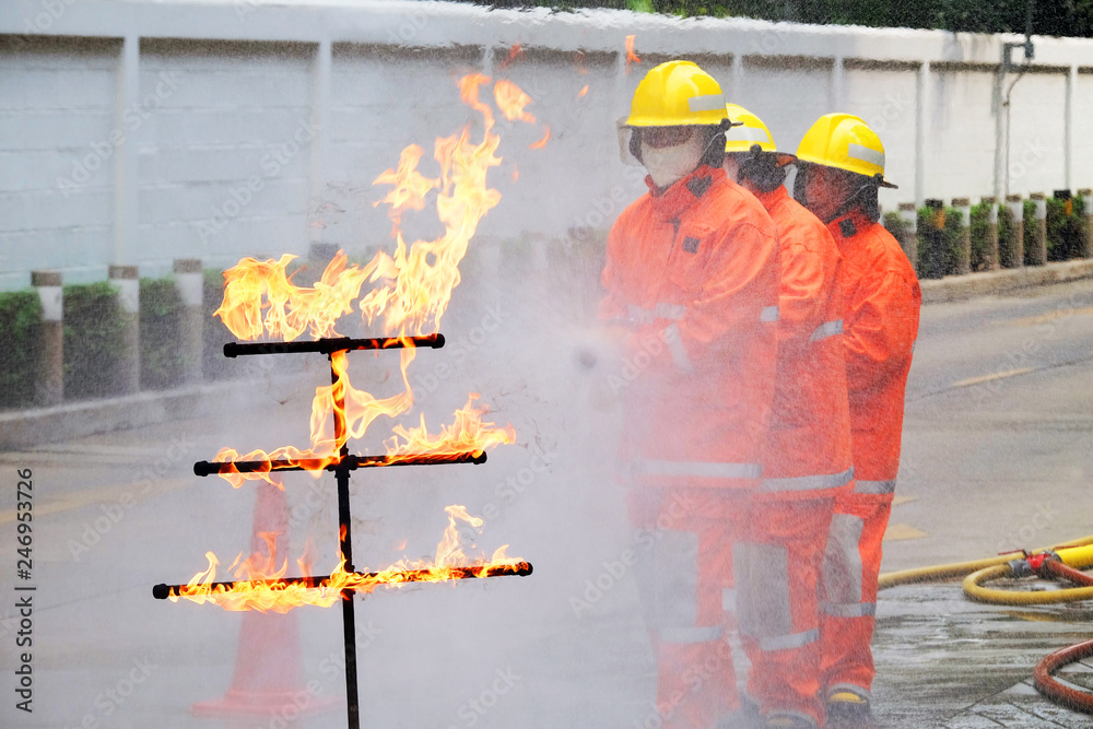 Scary fire brigade demonstrative prepared at a fire drill with ...