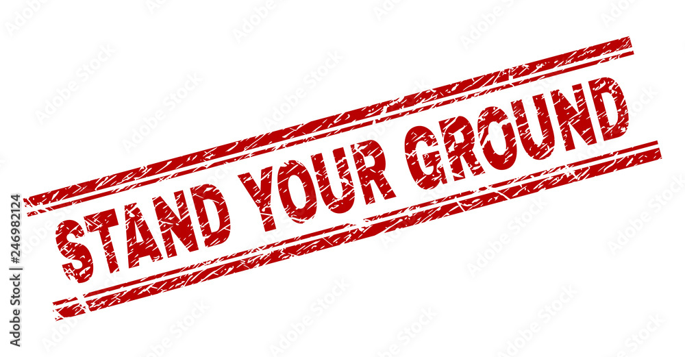 STAND YOUR GROUND seal print with corroded effect. Red vector rubber ...