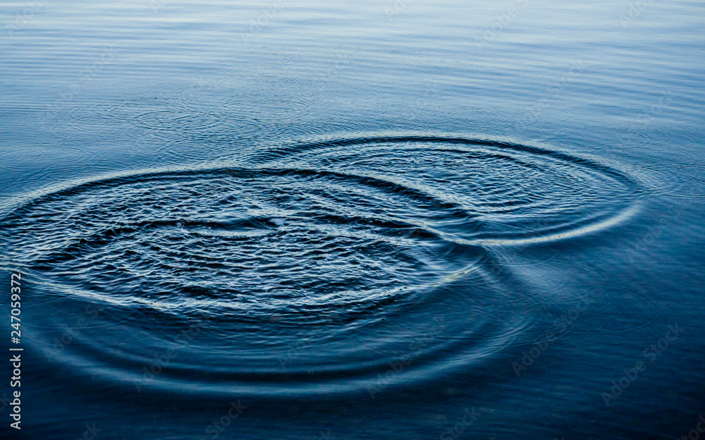 Ripples on sea texture pattern background. Round droplets of water over ...