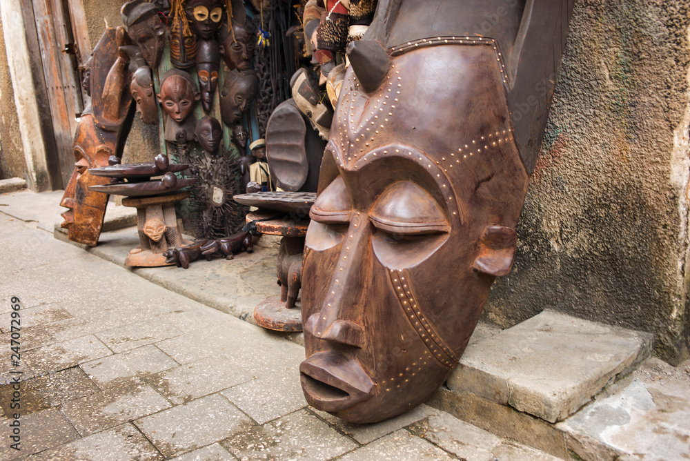 Stone town, Zanzibar/Tanzania -01-16-2019: african masks in souvenirs ...