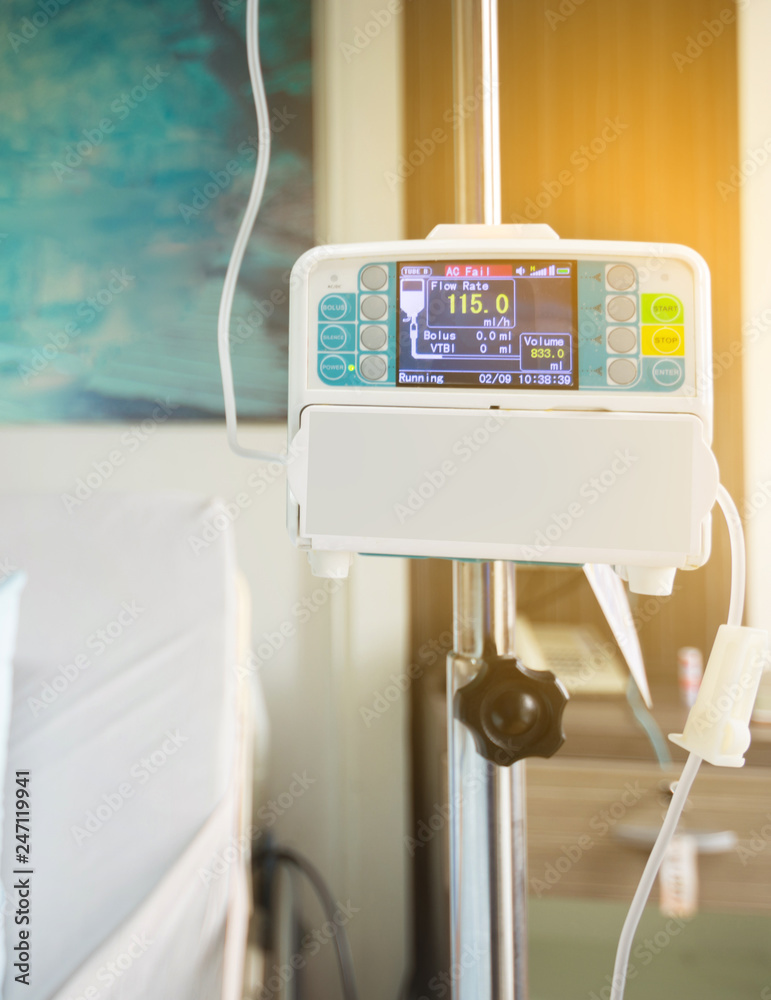 Infusion pump of saline solution drip treatment for patient in hospital ...