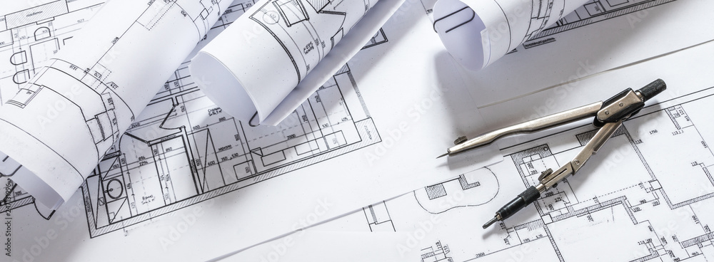 Architect drawing blueprints, architectural project in progress ...