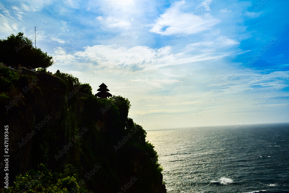 Sacred historical temple on top of the cliff abve pacific sea ocean ...