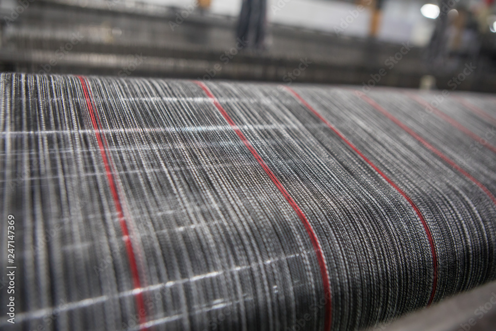 Yarn thread lines on the weaving loom machine. A loom machine for ...