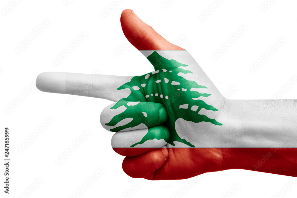 hand symbol with a sign of a gun, painted with the flag of lebanon ...