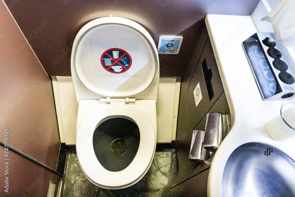 Lavatory toilet washroom in commercial flight aircraft Stock Photo ...
