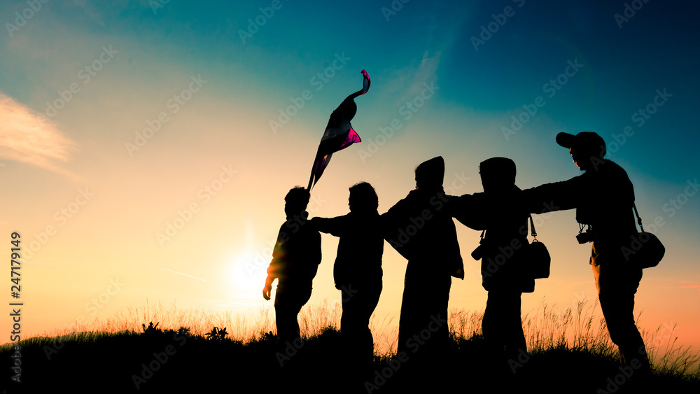 A Team holding Thailand flag and Move forward over head in sunset sky ...