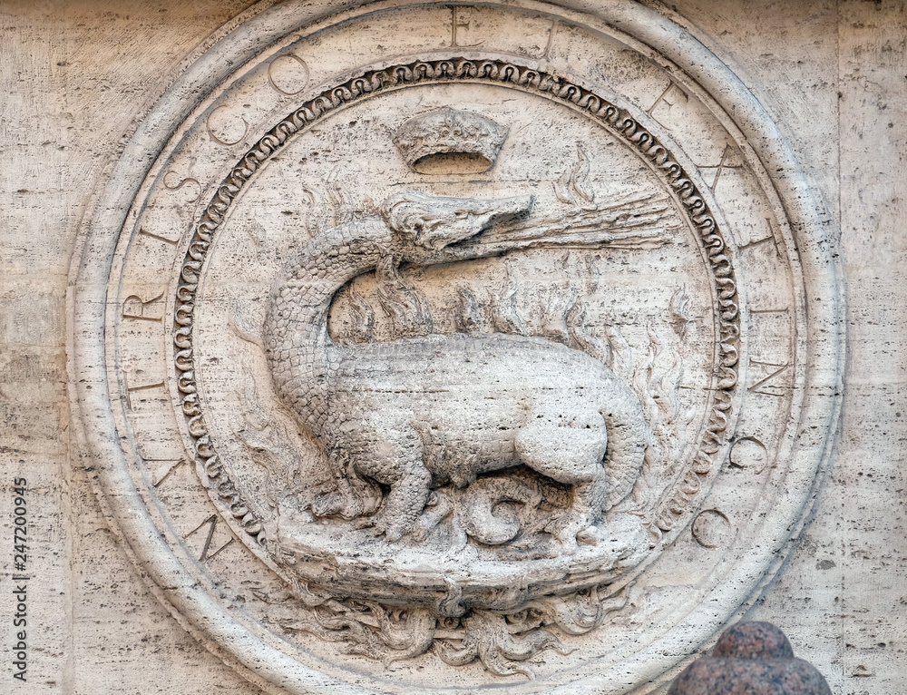 Heraldic salamanders on the facade of Chiesa di San Luigi dei Francesi ...