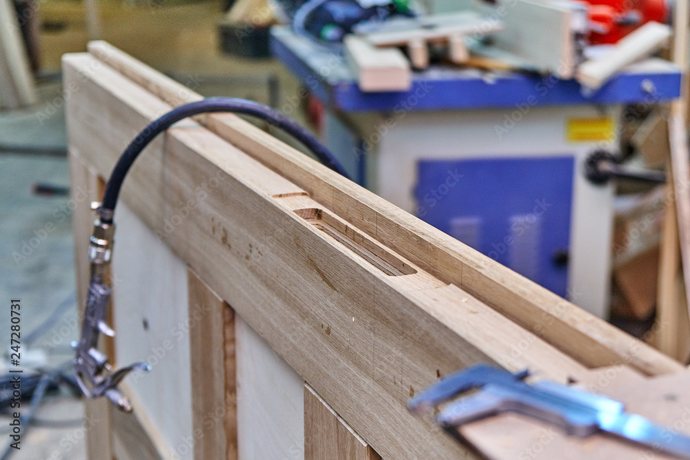 Wood door manufacturing process. Door leaf. Door lock installation ...