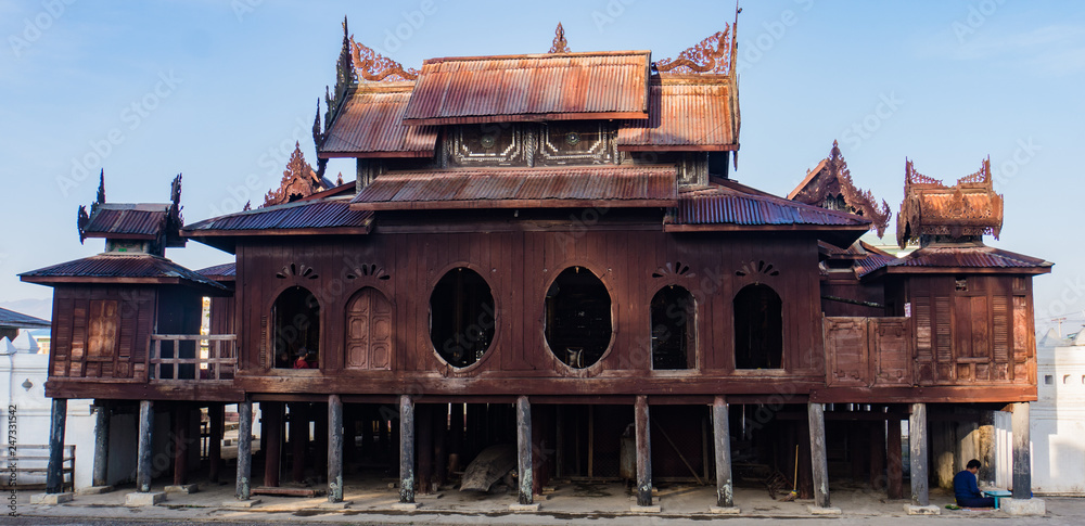 The iconic architecture of a Burmese Monastery :teak exterior and metal ...