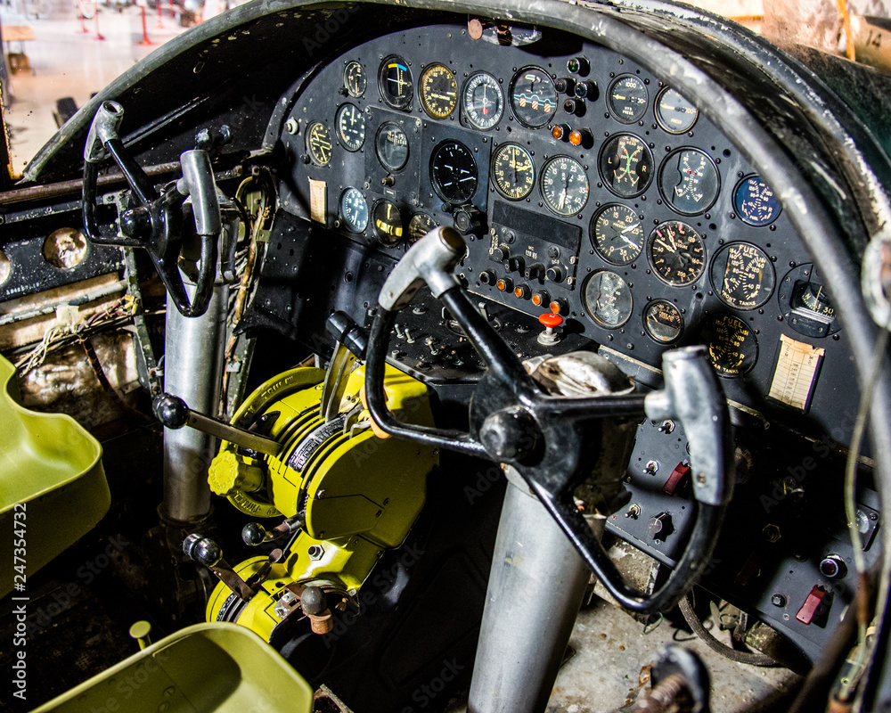 Interior cockpit of bombers throttle stearing wheel and gages Stock ...