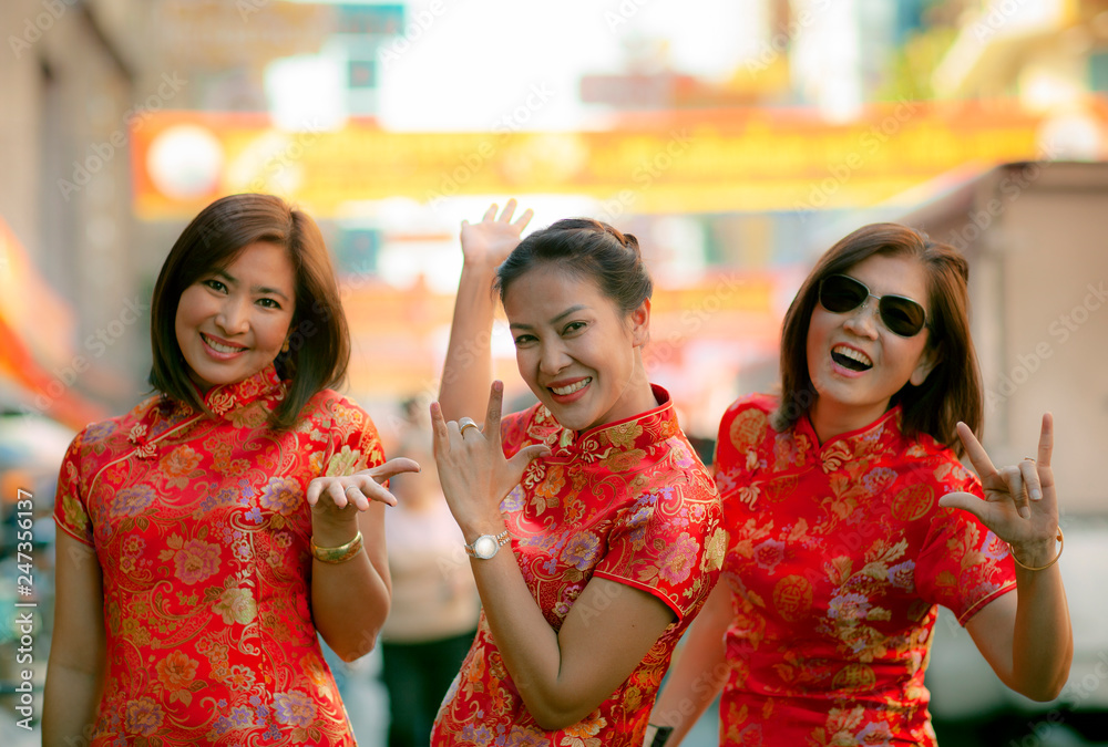 group of asian woman wearing chinese tradition clothes toothy smiling ...