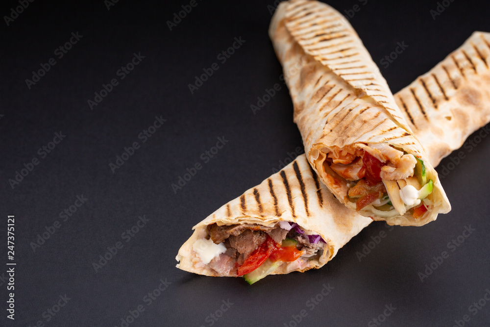 Shawarma sandwich - fresh roll of thin lavash or pita bread filled with ...