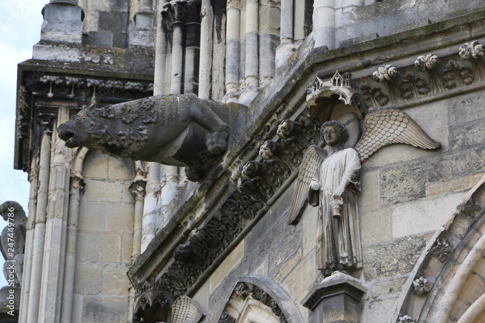 Gargoyle, angel, relief. Gothic, historic Cathedral of Our Lady of ...
