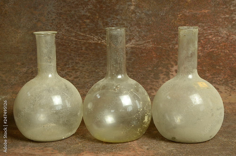 Zdjęcie Stock: Old chemical flasks | Adobe Stock