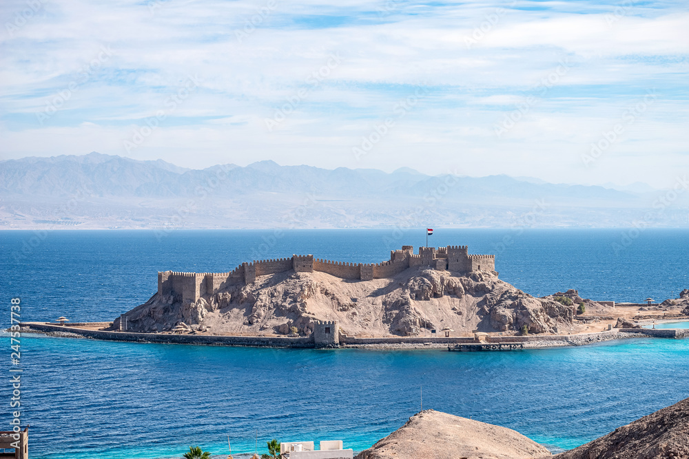 Ancient military fort Salah El Din Citadel on a small island on the ...