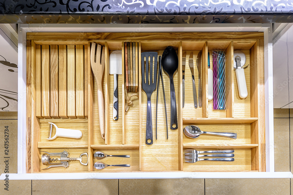 Opened kitchen drawer , a smart solution for kitchen storage and ...