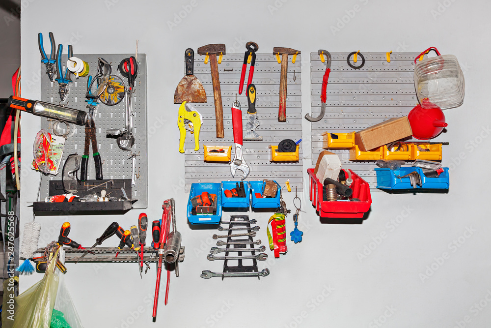 Tools assorted on the wall - Repair concept Stock Photo | Adobe Stock