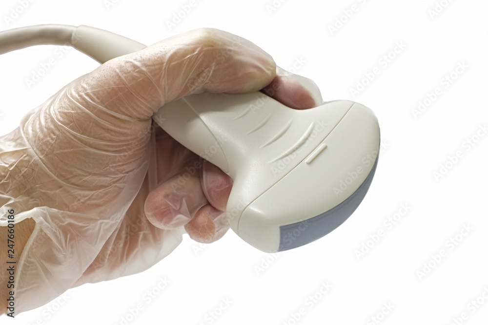 Abdominal convex adult ultrasound probe held in left hand in semi ...