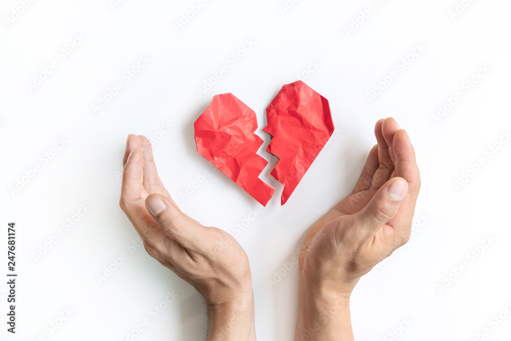 Red crumpled and broken heart shape paper and man's hand Stock Photo ...