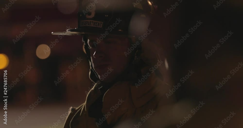 Firefighter at night Stock Video | Adobe Stock