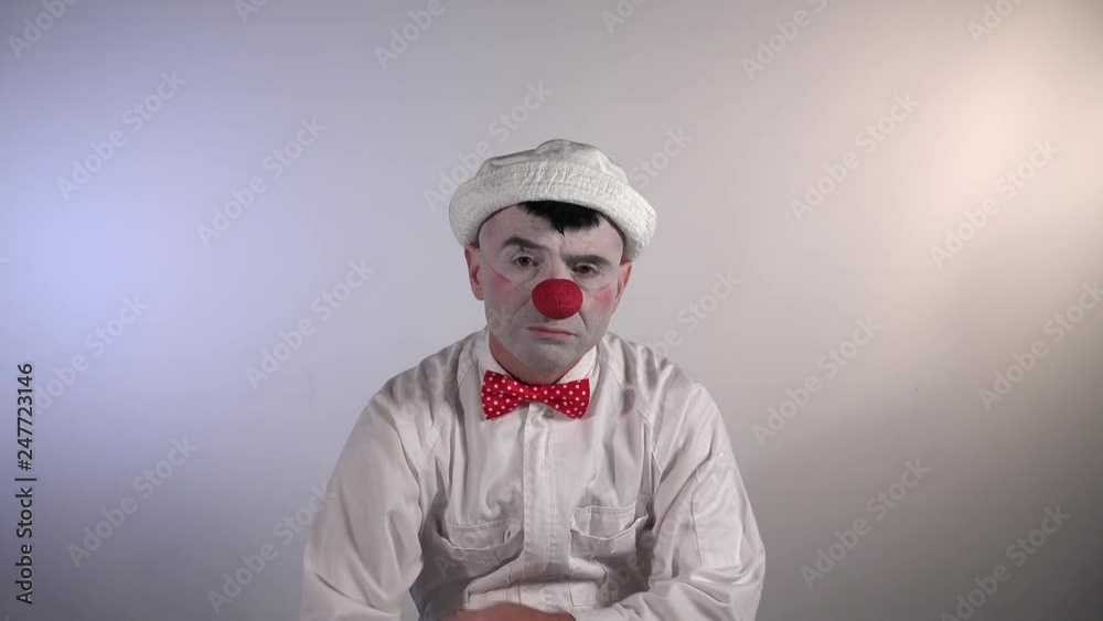 Emoji Clown. A clown mime with a face with a raised eyebrow of ...