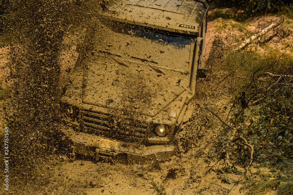 Mud and water splash in off-road racing. Expedition offroader. Best Off ...