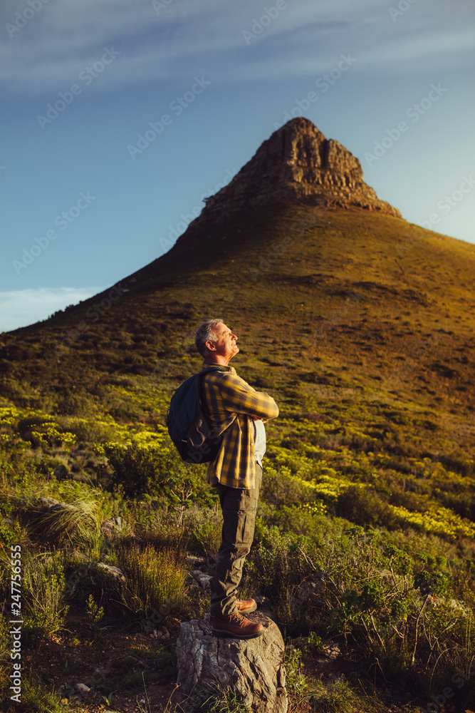 Man enjoying the beauty of nature Stock Photo | Adobe Stock