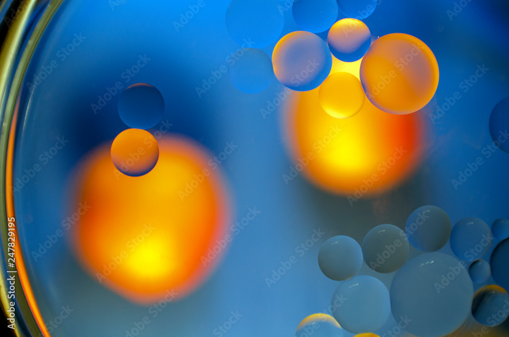 yellow orbs and circles, the circles on a blue background Stock Photo ...