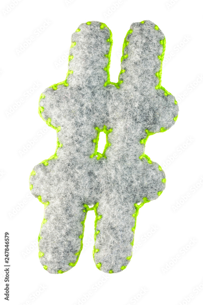 The octothorpe symbol (#) typographic sign from gray felt isolated on a ...
