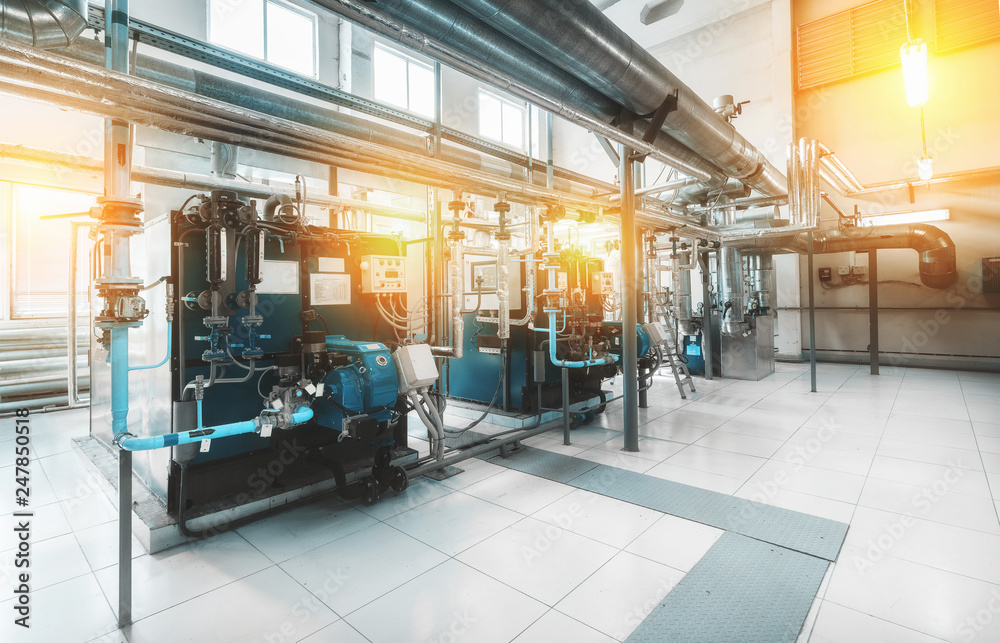 Modern industrial gas boiler room equiped for heating process. Heating ...