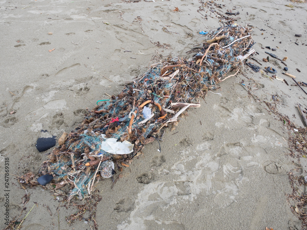 fishing net full of plastic waste. Symbol fo ocean pollution Stock ...