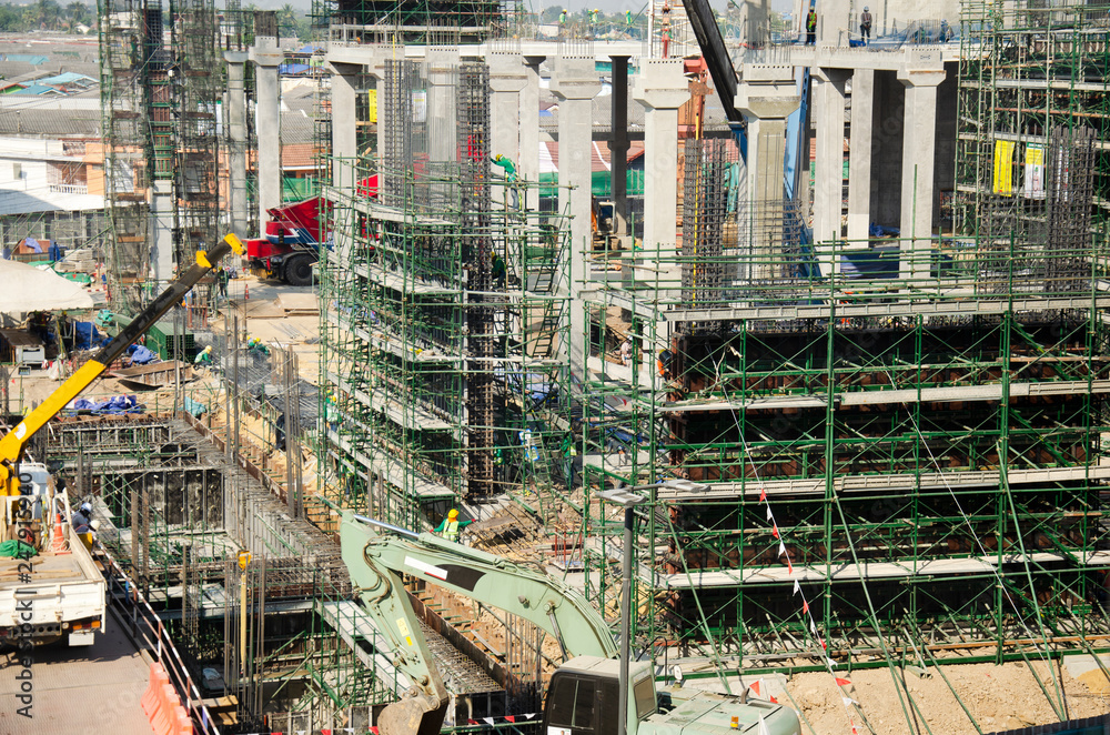 Asian people and thai workers with heavy machinery working builder new ...