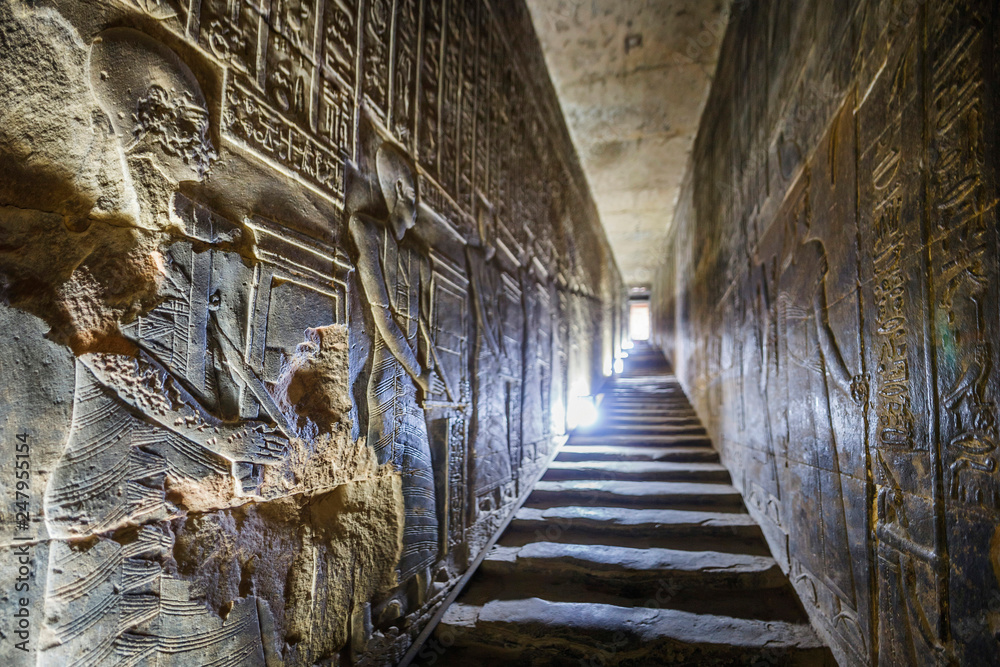 DENDERA TEMPLE, QENA, EGYPT - DECEMBER 05, 2018: Corridors with ancient ...