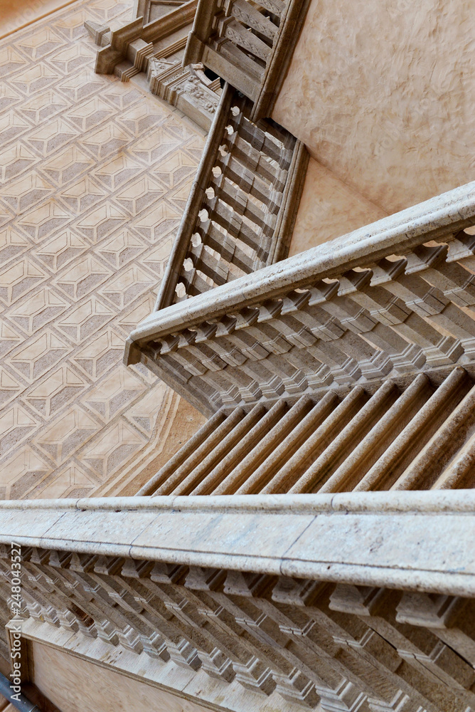 Elegant stone staircase with railings at the entrance to the medieval ...