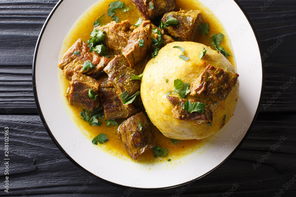 Traditional Mofongo with plantains, garlic and chicharron served with ...