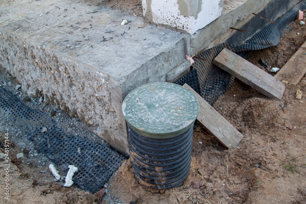 inspection manhole and concrete foundation porches with supporting ...