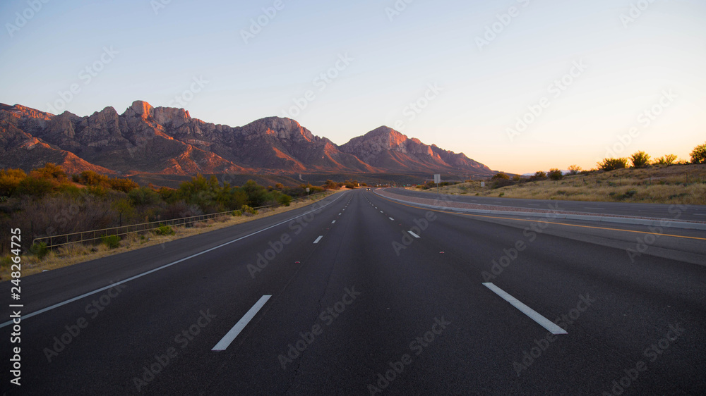 open road with mountain background. good for travel, wanderlust and ...