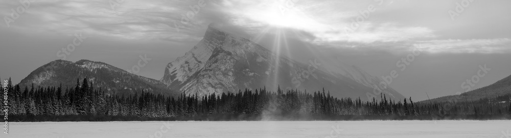 Mt. Rundle and Vermillion Lake in the snow and winter cold scenery ...