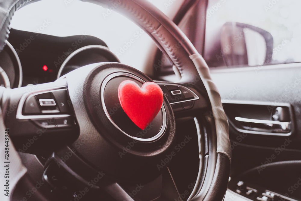 Steering wheel with heart red object.Love car concept idea.interior ...