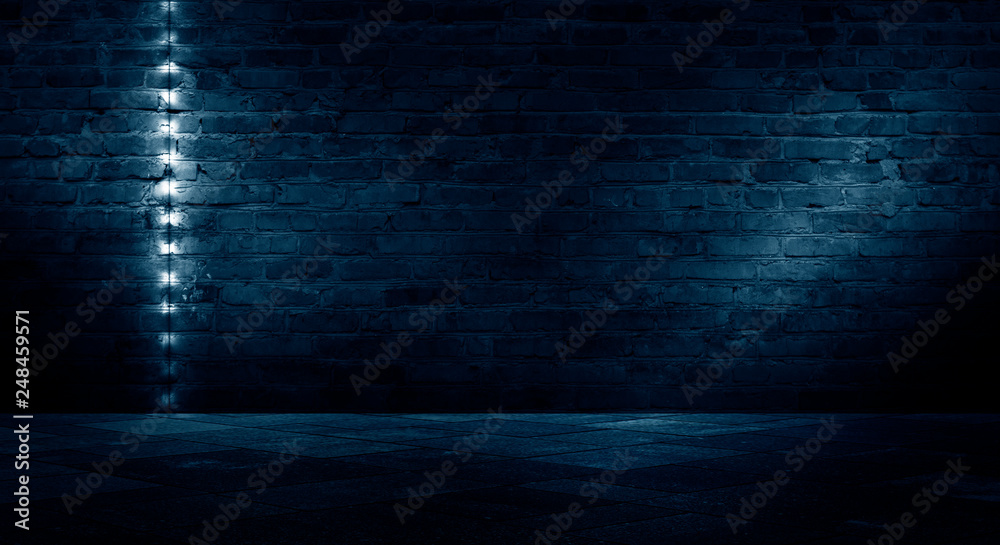 Old brick wall, dark room with brick wall, rays of searchlight light ...