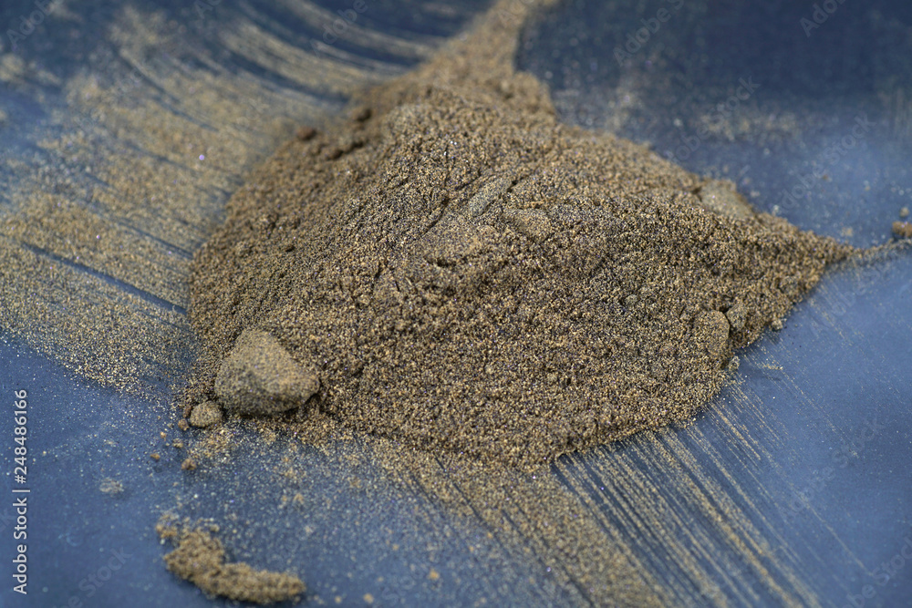 Potassium powder is a chemical element and was photographed here with a ...